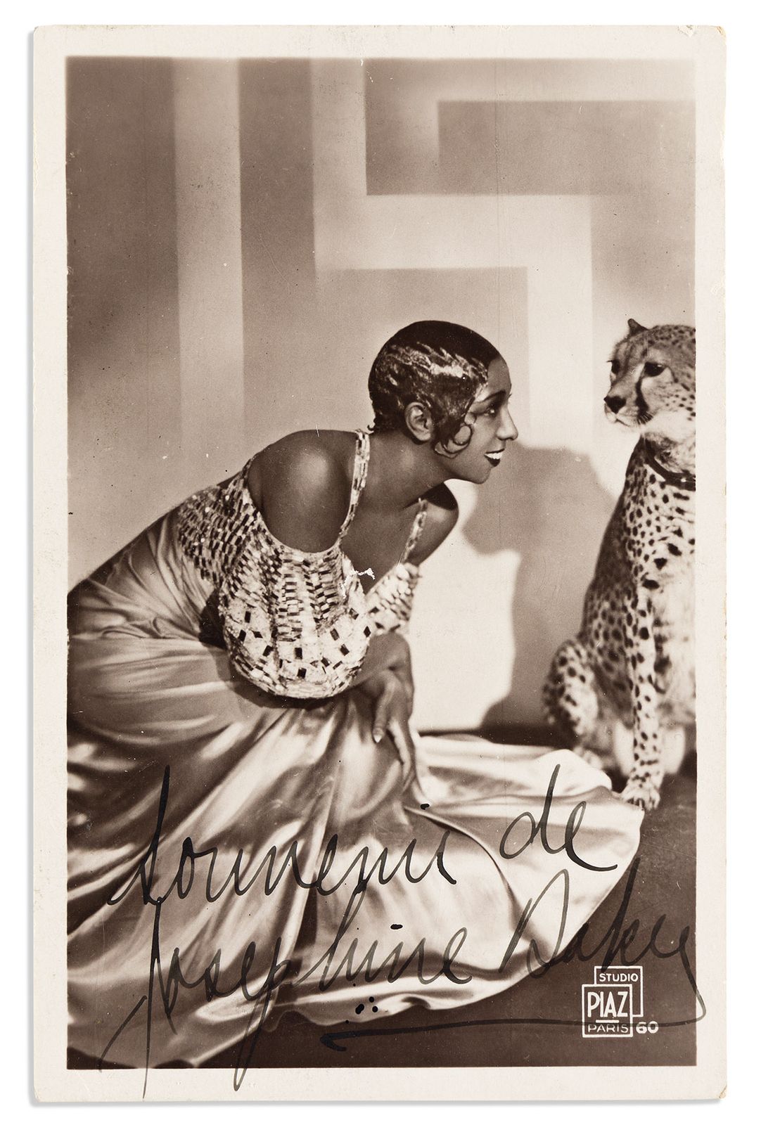 (ENTERTAINERS.) BAKER, JOSEPHINE. Photograph postcard Signed and ...