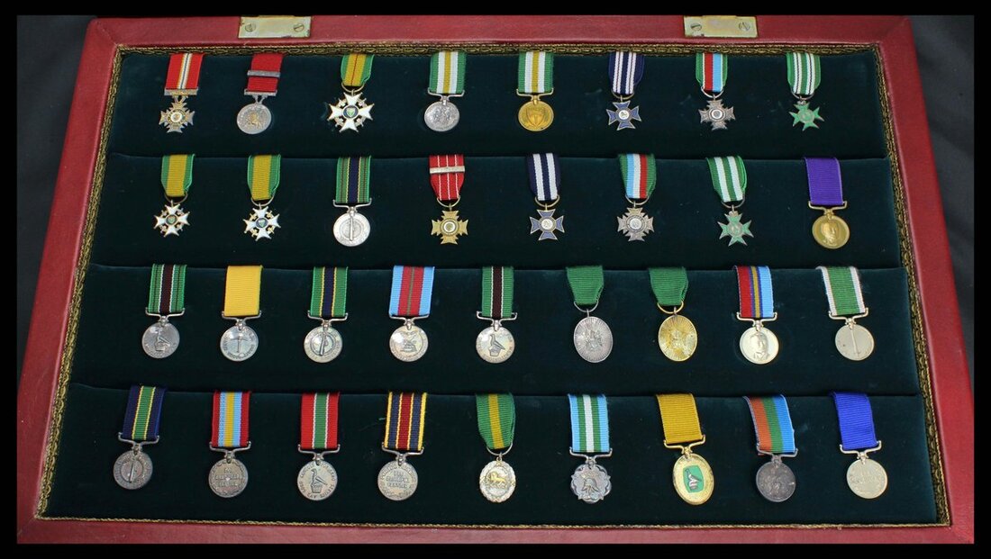 A comprehensive collection of Rhodesian miniature medals, comprising an ...