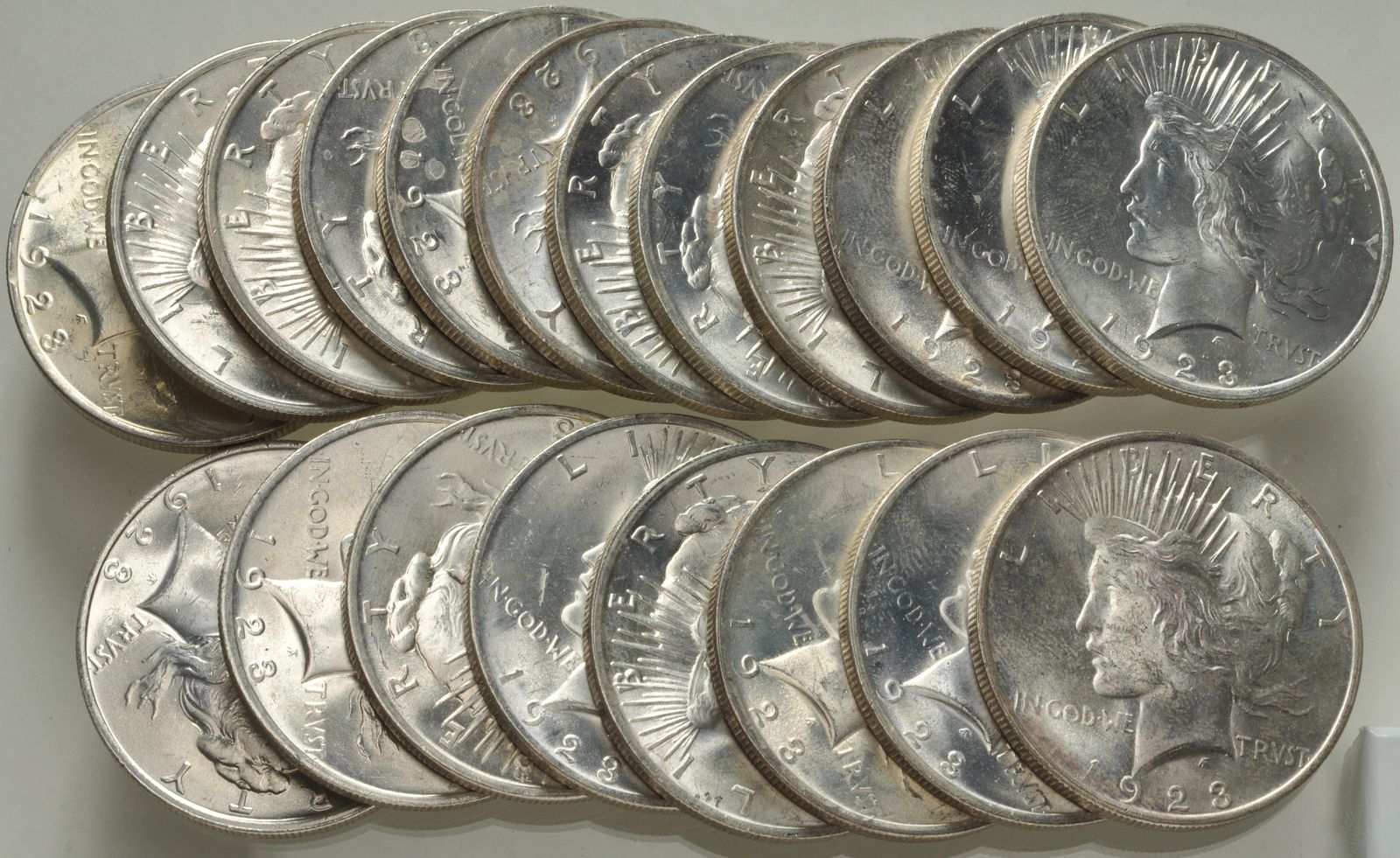 1923 Peace Dollars. One original Uncirculated roll of twenty (20) coins ...
