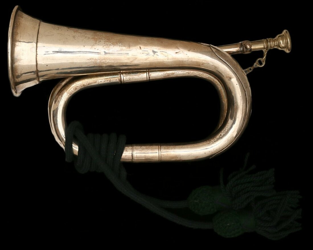 A silver Presentation Bugle presented by the Cowan family to the ...