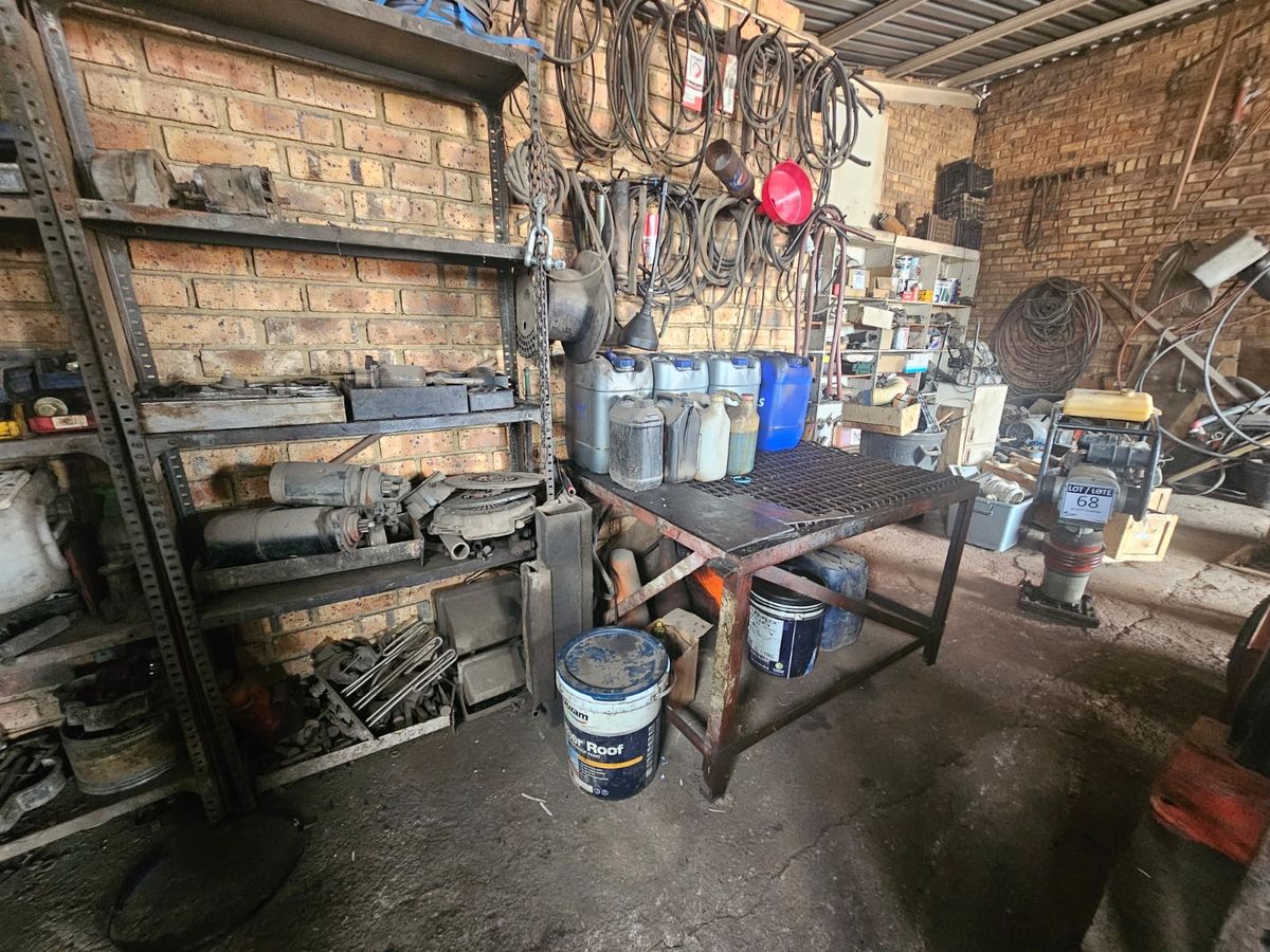 LOT OF TWO (2) STEEL RACKS WITH TABLE & VARIOUS WORKSHOP SPARES | Panabid