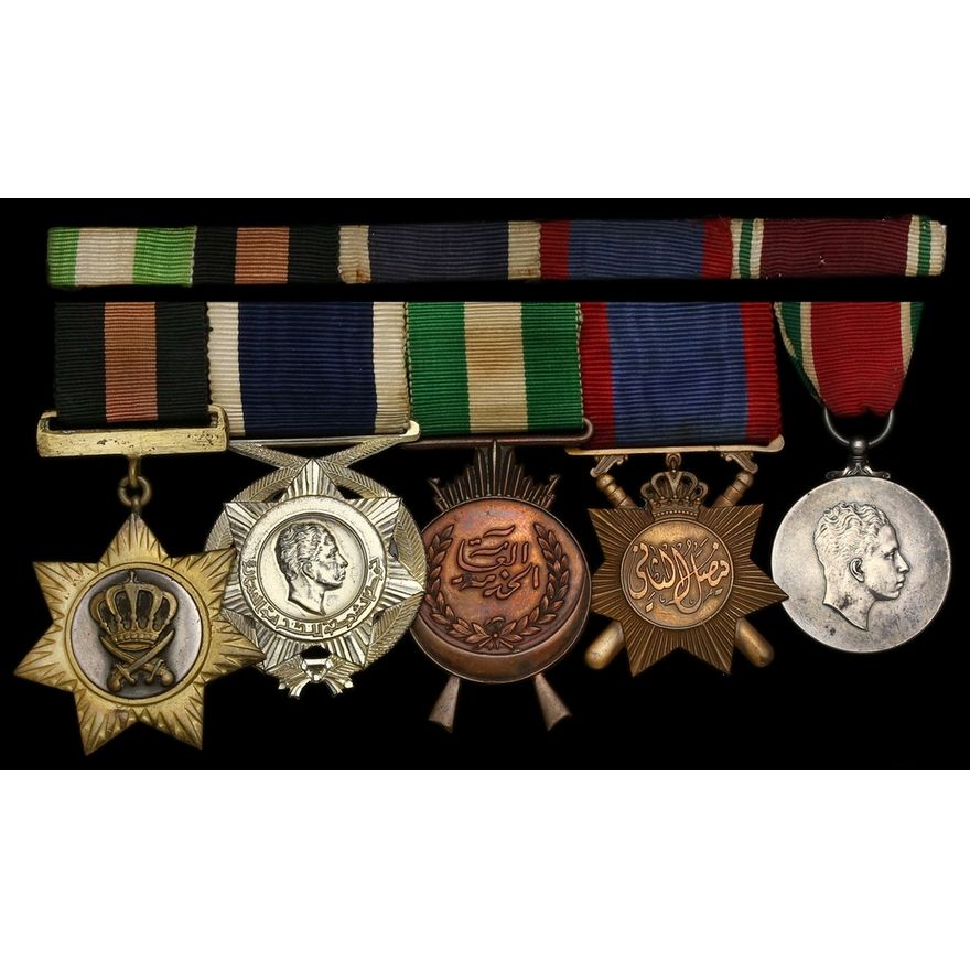 A mounted group of five Iraqi police medals awarded to 2nd Lieutenant H ...