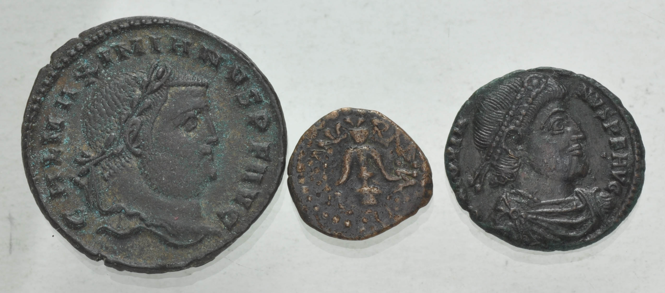 MIXED. Greek - Roman Imperial. Lot of three (3) bronze issues ...