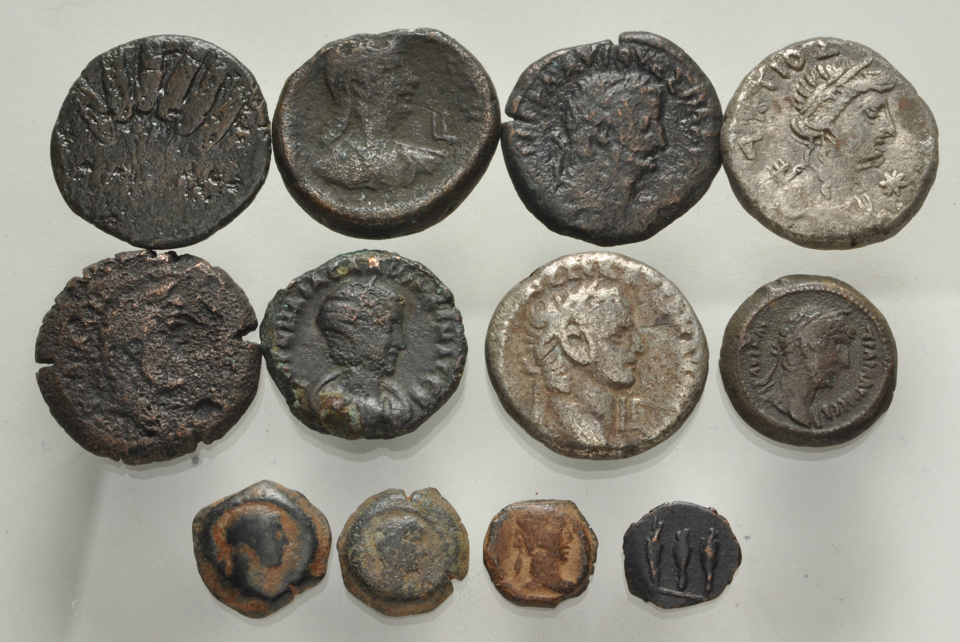 ROMAN. Provincial. Lot of twelve (12) billon, potin, and bronze issues ...