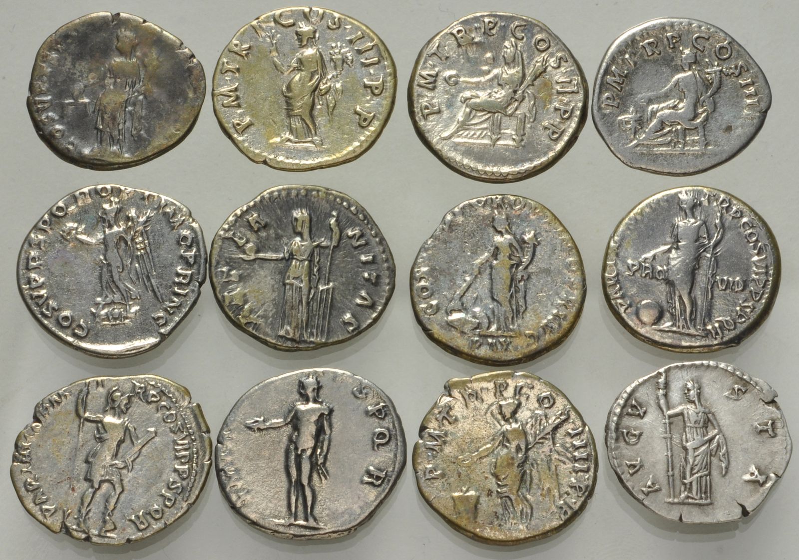 ROMAN. Imperial. Lot of twelve (12) AR Denarii of Trajan and Diva ...