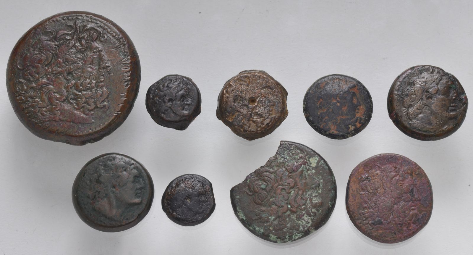 GREEK. Egypt & North Africa. Lot of nine (9) Ptolemaic bronze issues ...