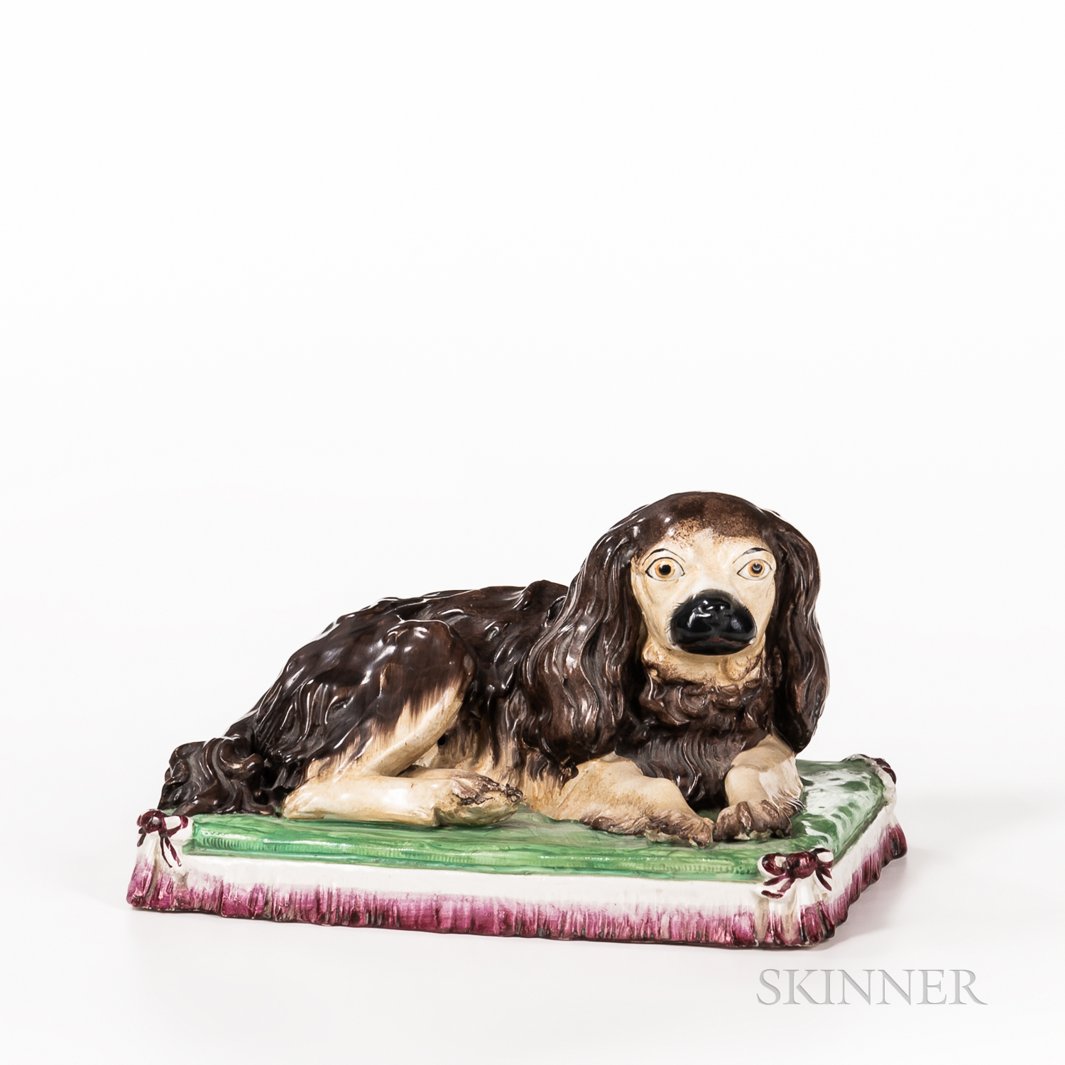Large Staffordshire Pottery Model of a Seated Spaniel | Barnebys
