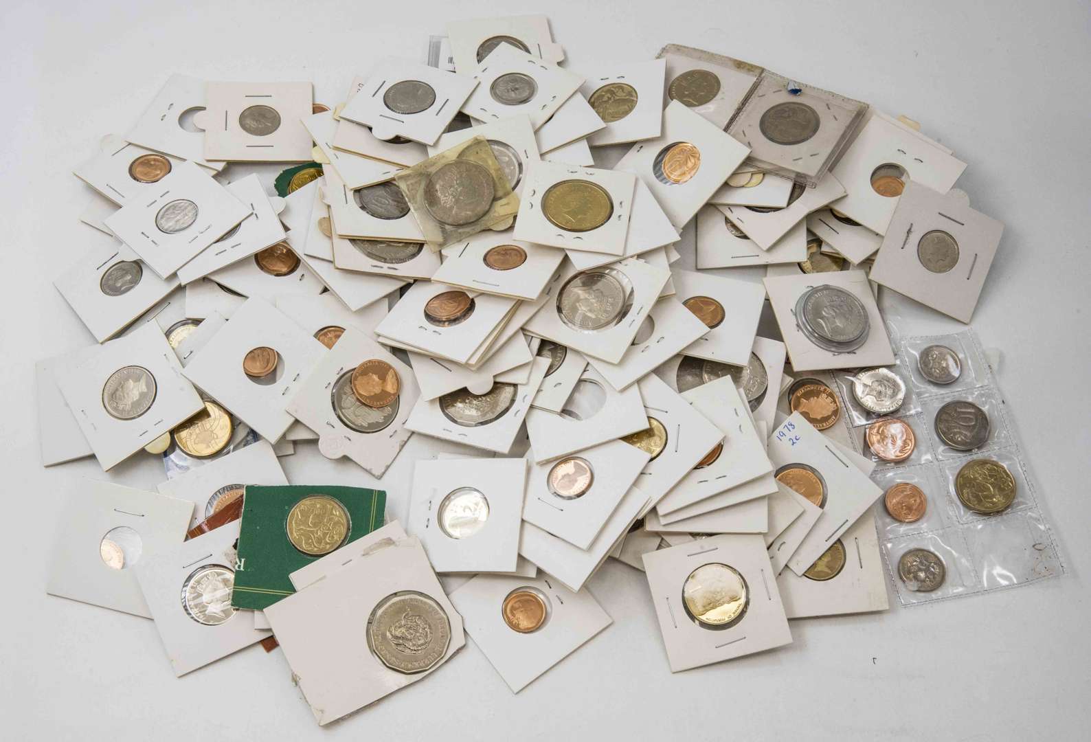 Proof One Cent to Two Dollars with a few Unc and foreign coins. Mostly ...