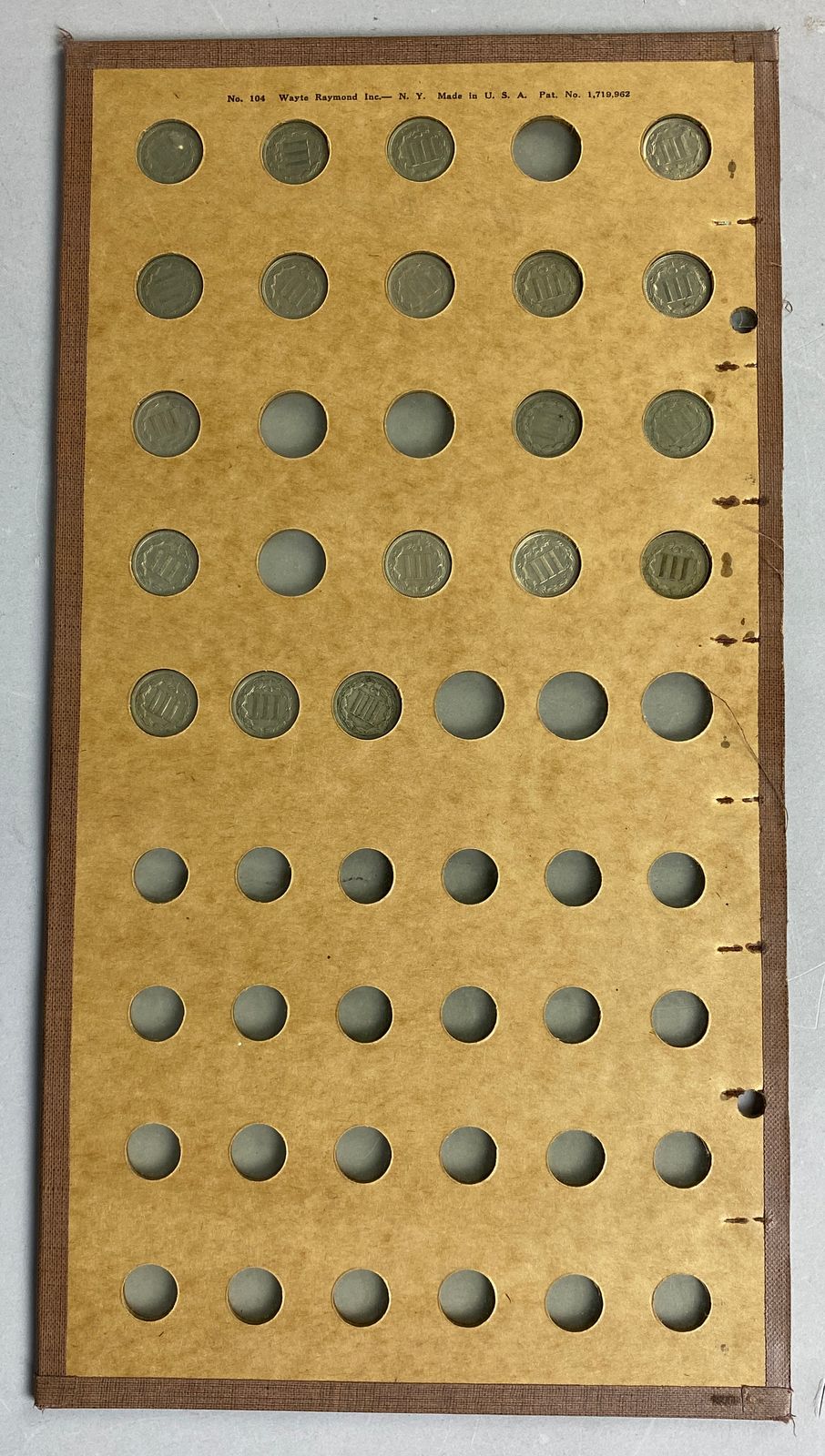 Nickel Three-Cent Pieces. Partial set in Wayte Raymond board. Fine to ...