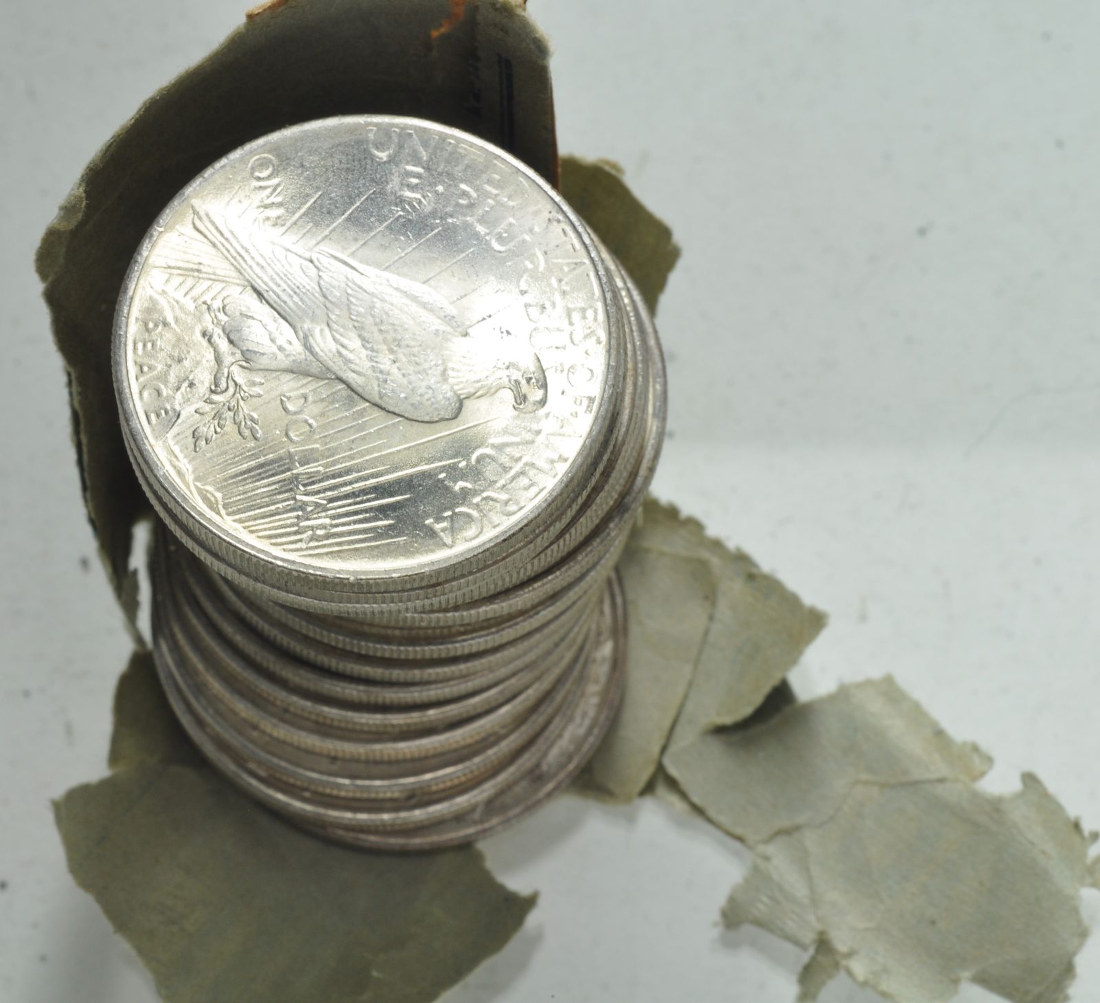 1924 Peace Dollars. One original Uncirculated roll of twenty coins ...