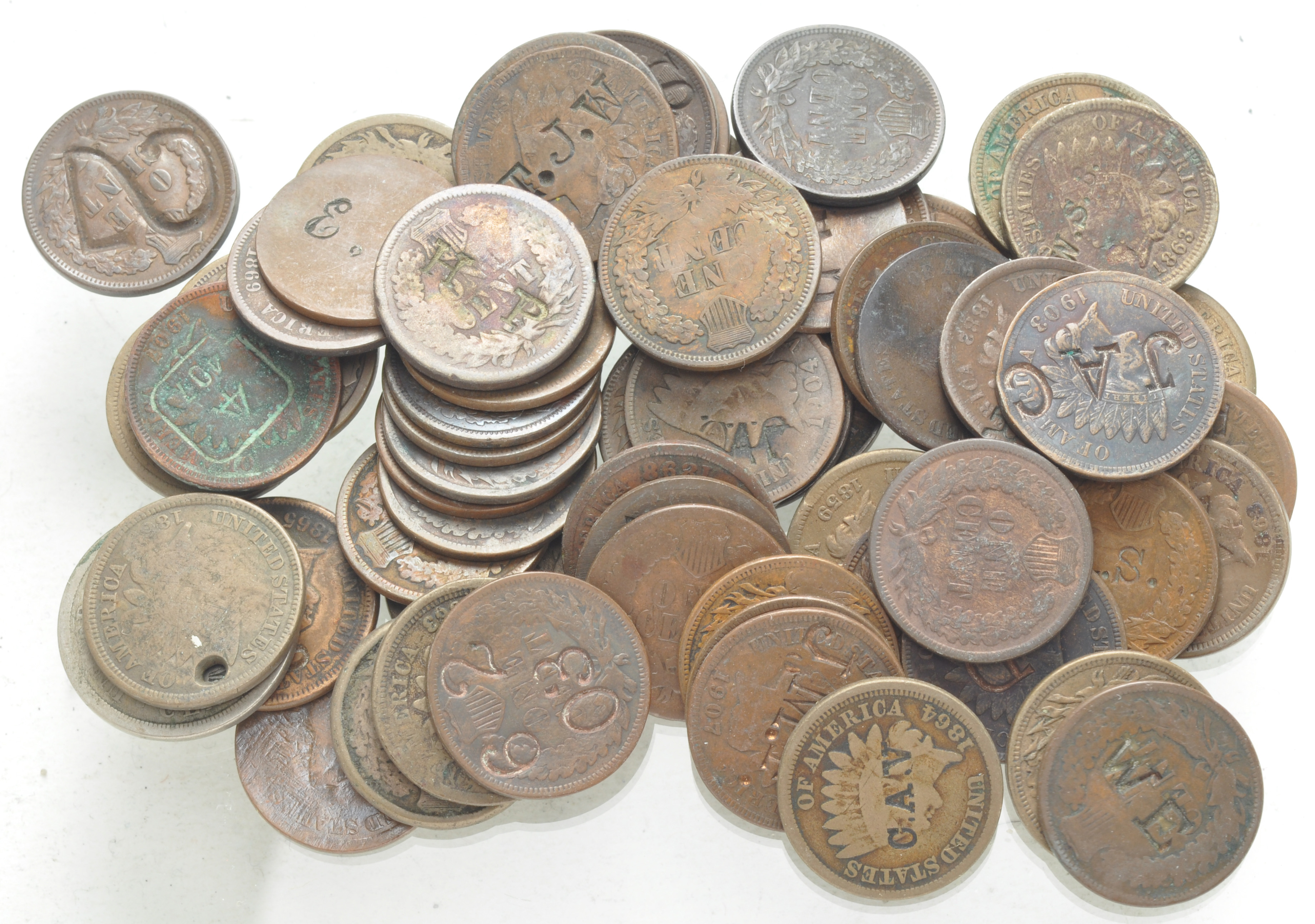 Lot of sixty-one (61) counterstamped Indian Head Cents. Average ...