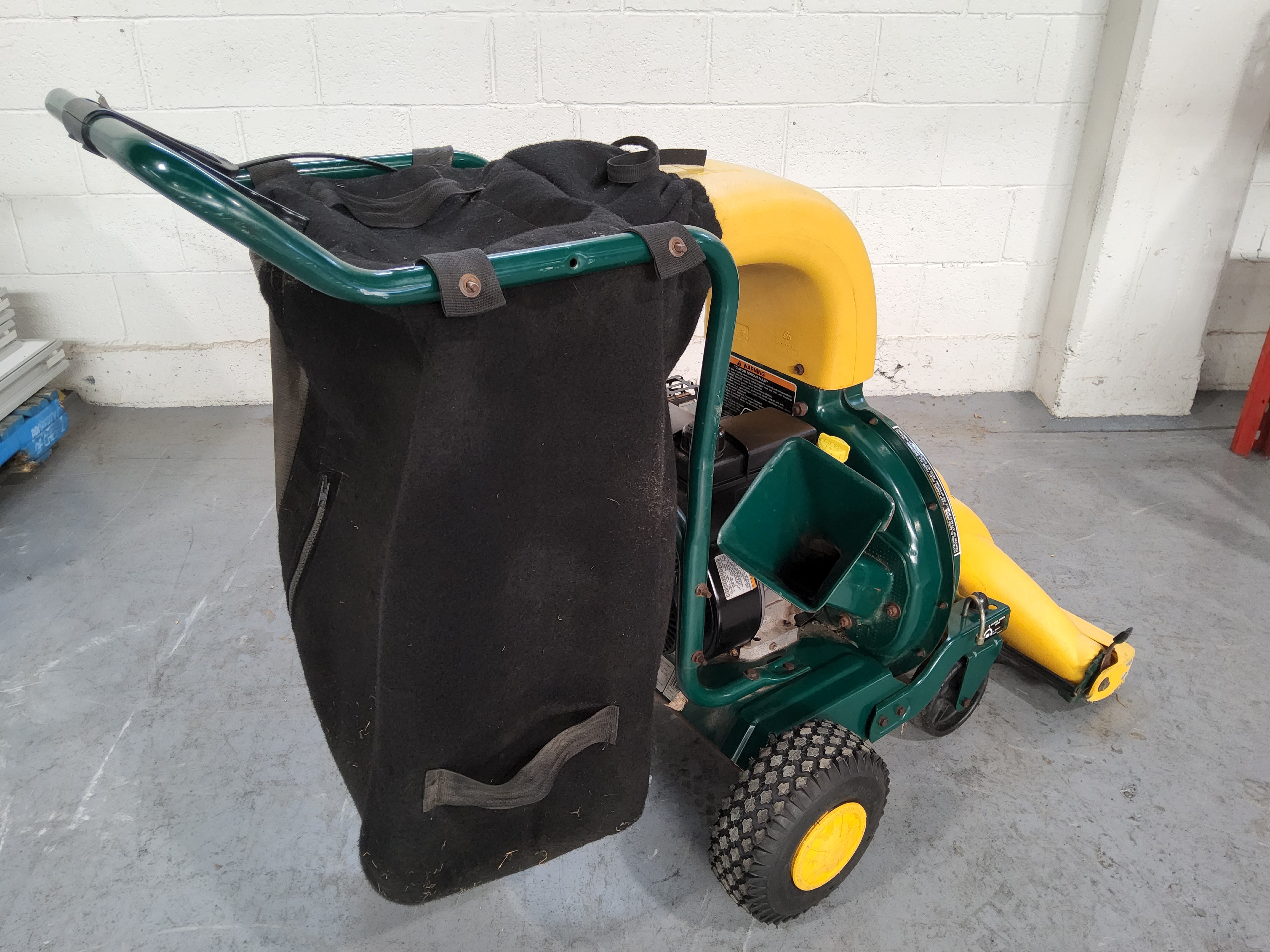 Yard Man 5.5HP self propelled chipper shredder vacuum Mainland Auctions