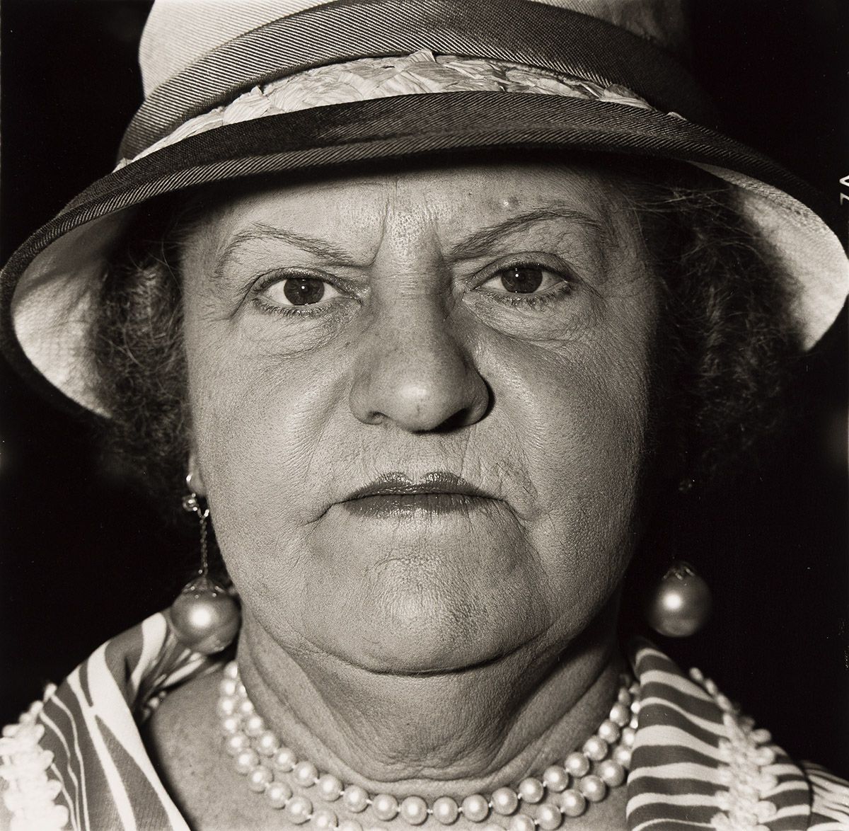 DIANE ARBUS (1923-1971) Woman with Pearl Necklace and Earrings, N.Y ...