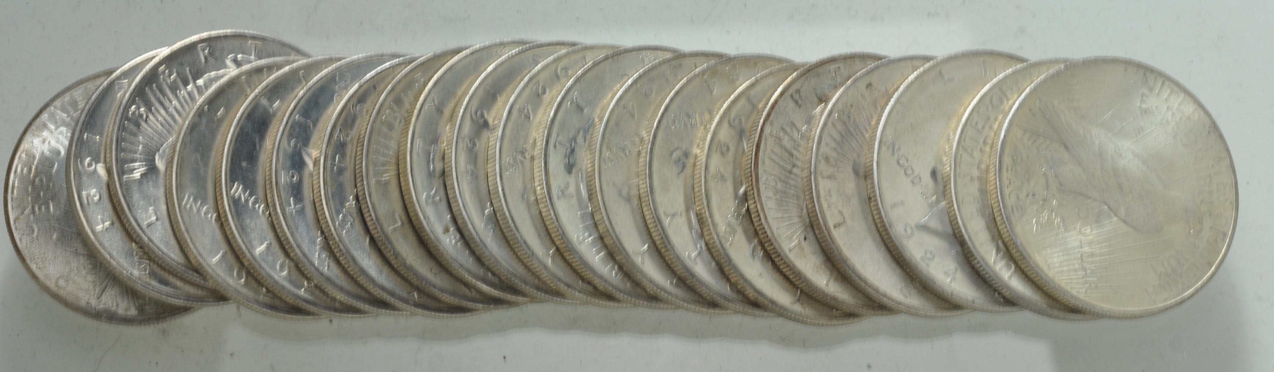 1924 Peace Dollars. One original Uncirculated roll of twenty coins ...