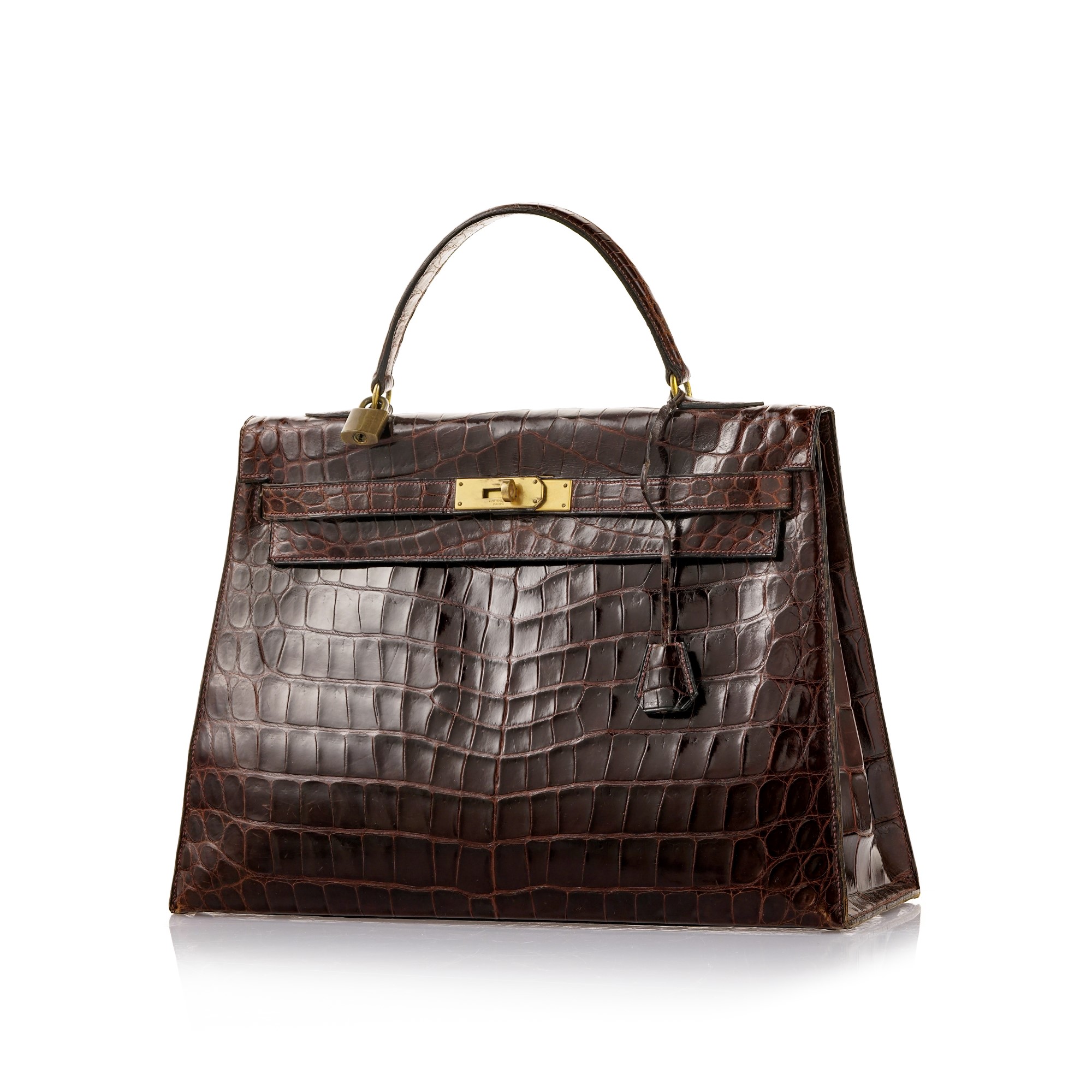 Hermès, sac Kelly 32 en crocodile niloticus marron, années 1960 ...